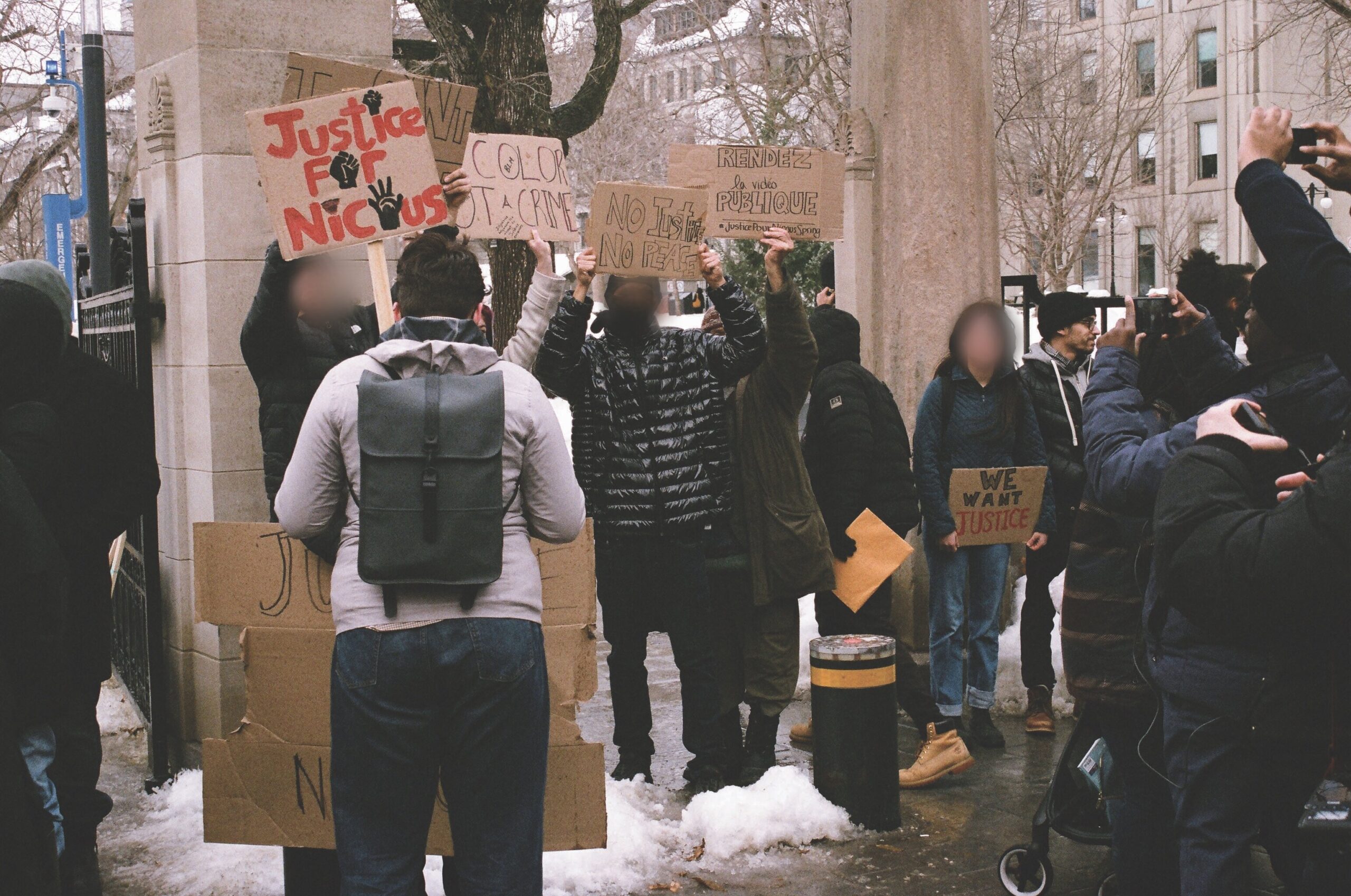 Protestors rally for poet and boxer Nicous D’Andre Spring after ...